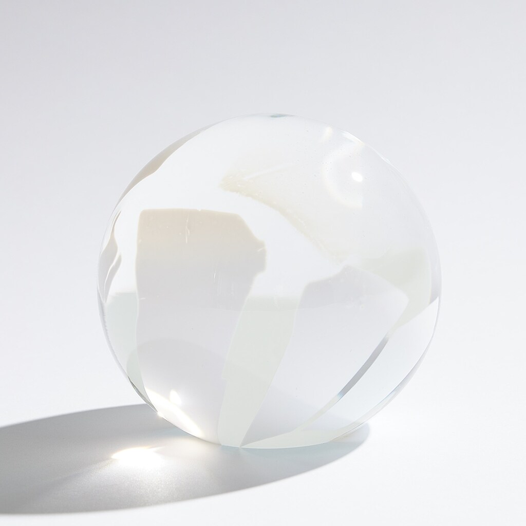 Glass Flakes Orb Paperweight In White by Global Views | 1StopBedrooms