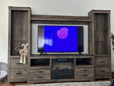 Trinell 4 Piece Entertainment Center with Electric Fireplace In Brown by Ashley Furniture 1StopBedrooms
